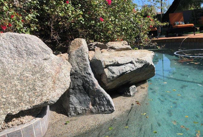 Calcium Deposits on Decorative Rocks Removed