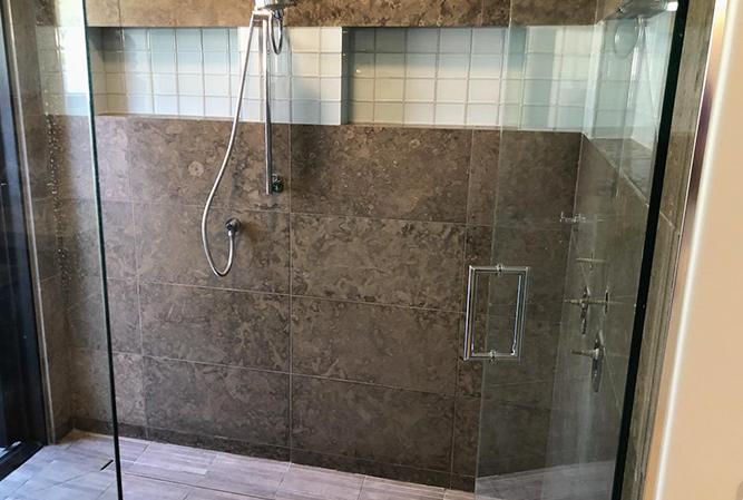 Elegance Restored to Limestone Shower | Phoenix Tiling Services