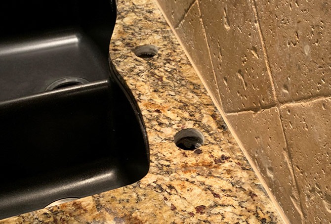 Granite Crack Behind Sink Repaired | Beyond Stone Solutions