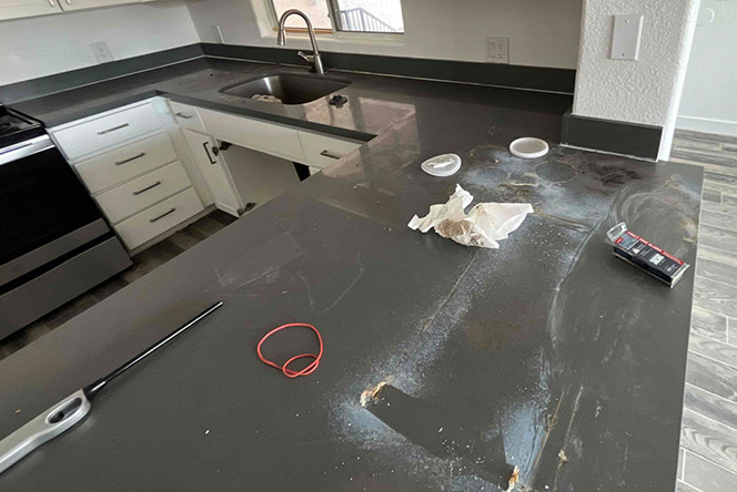 Rental Property Engineered Stone Countertop Damage Erased | Tiling ...