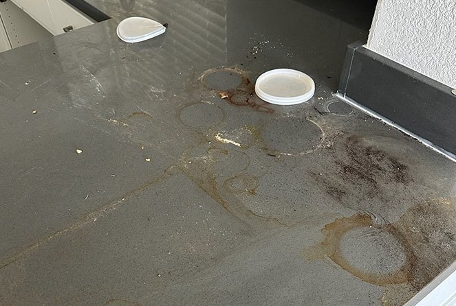 Rental Property Engineered Stone Countertop Damage Erased | Tiling ...