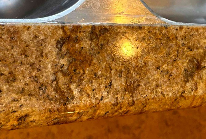 Rusted Rebar Granite Damage Repaired | Tiling Services in Phoenix